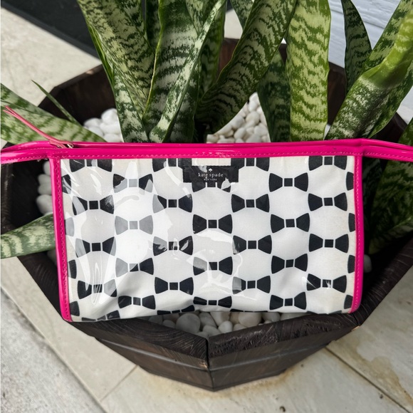 kate spade | Bags | Kate Spade New York Bow Print Wristlet Clutch Pink ...